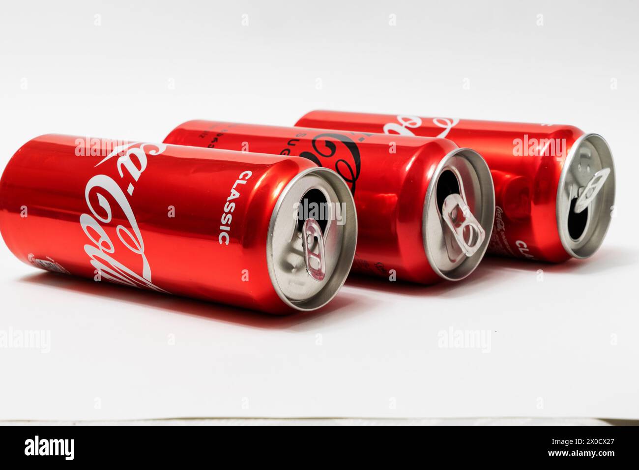 BAKU, AZERBAIJAN - January 01, 2013 : Red, tin three empty Coca-Cola ...