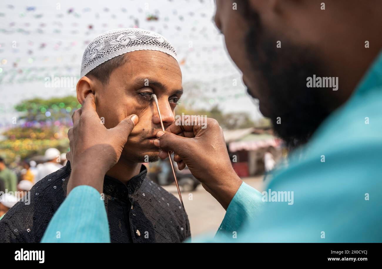 GUWAHATI, INDIA - APRIL 11: A Muslim man applies Surma on eyes during ...