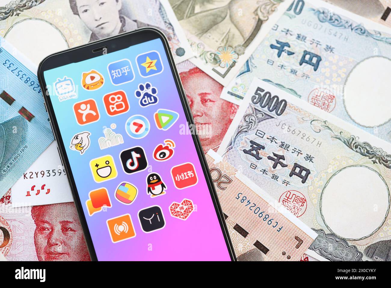 KYIV, UKRAINE - APRIL 1, 2024 Asian apps icon on smartphone screen on ...