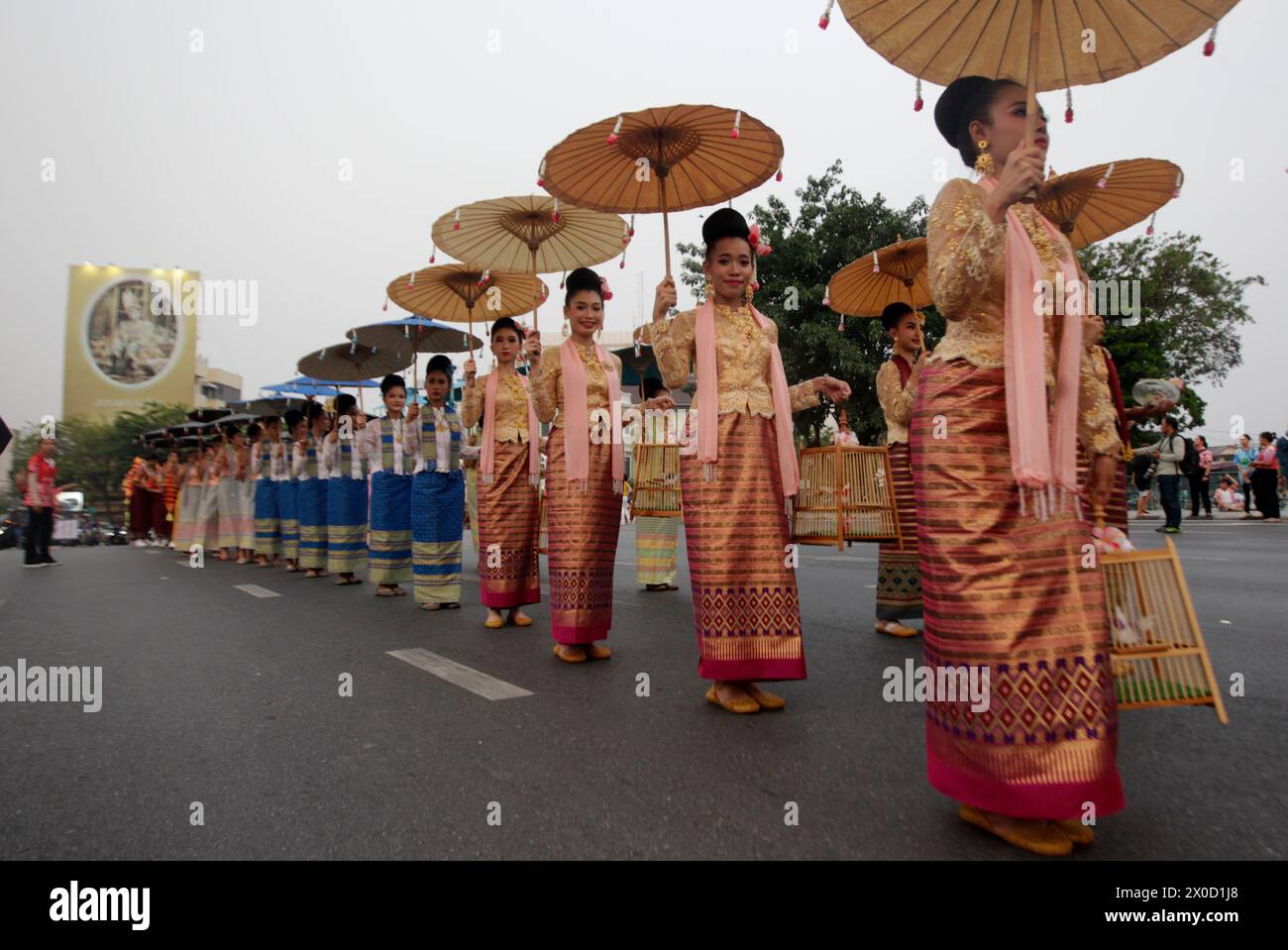 Performers in costumes take part in a parade during the celebration of ...