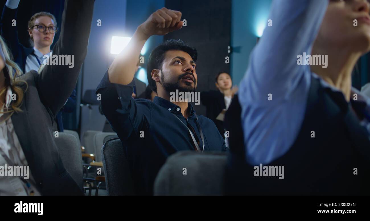 Indian man raises hand hi-res stock photography and images - Alamy