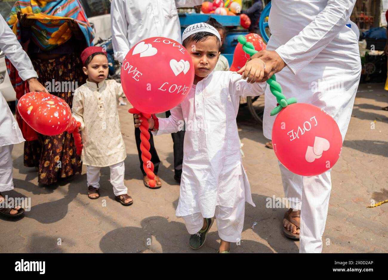 April 11, 2024: GUWAHATI, INDIA - APRIL 11: Muslim people with children ...