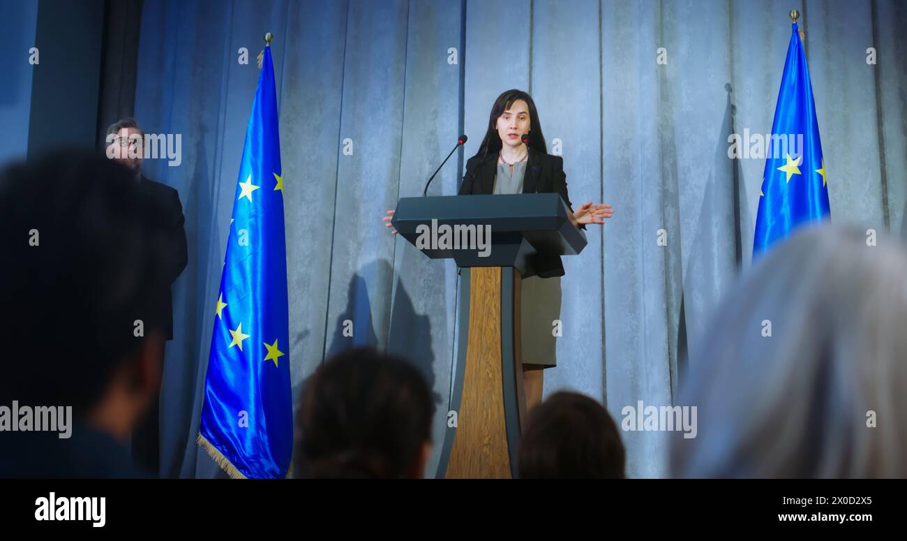 Confident politician makes an announcement, answers media questions and ...