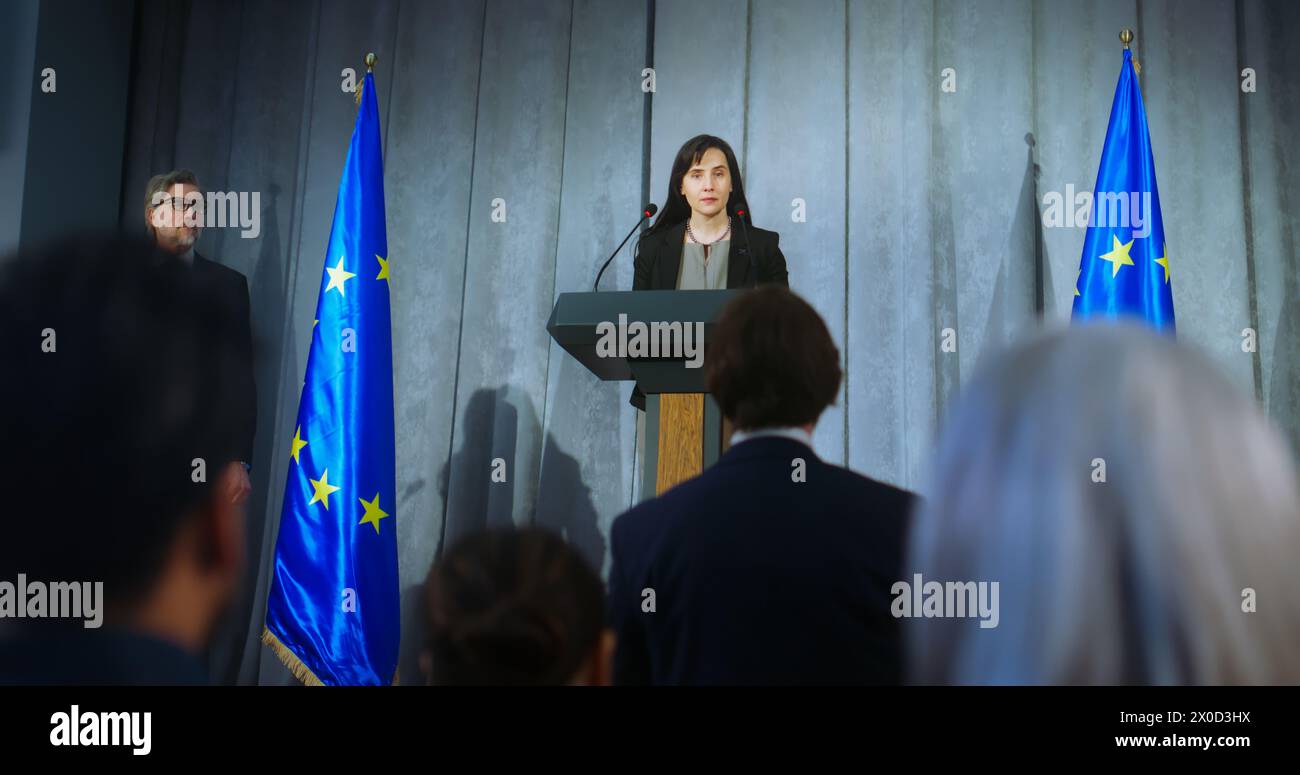 Confident politician makes an announcement, answers media questions and ...