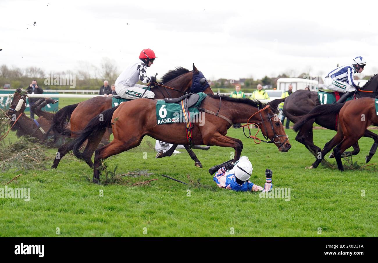 Jockey Ben Sutton after falling from Drop Flight during the Randox ...