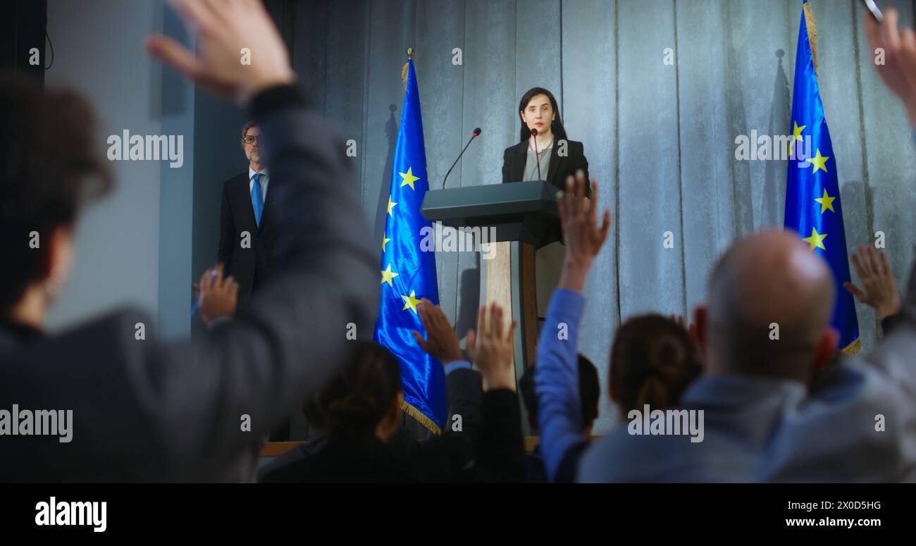 Female politician comes to tribune, delivers campaign speech, answers ...