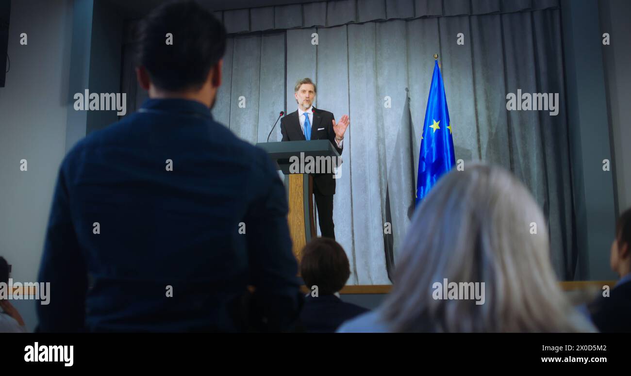 Mature representative of the European Union during performance at press ...