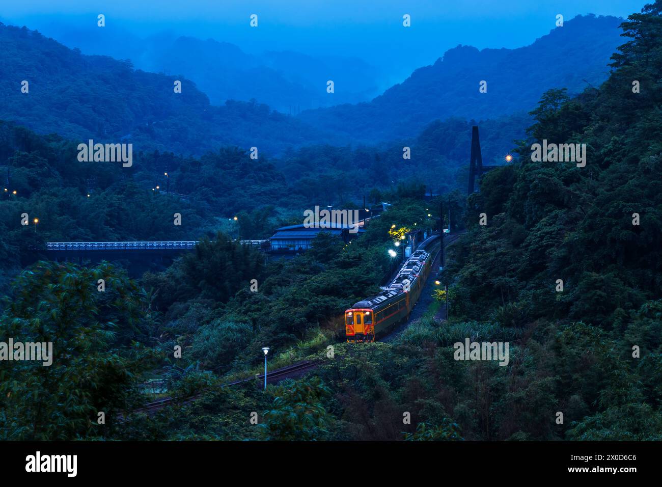 In a misty dawn of early summer in New Taipei City, northern Taiwan, a ...