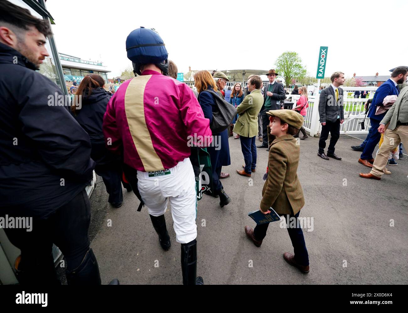 Jockey Daniel Cherriman (left) makes his way back after competing in ...