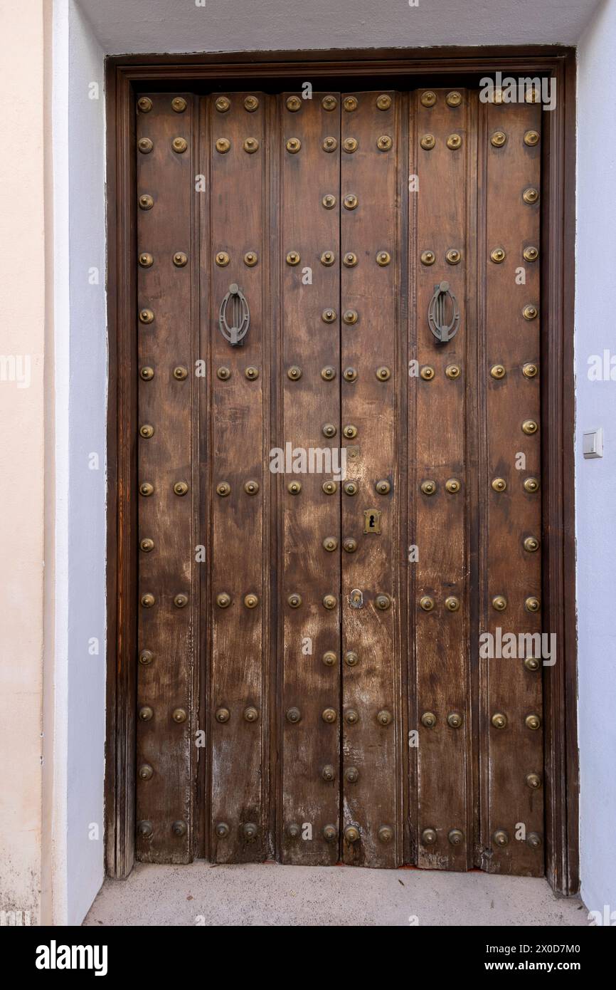 View of a thick old wooden medieval door with large rivets Stock Photo ...