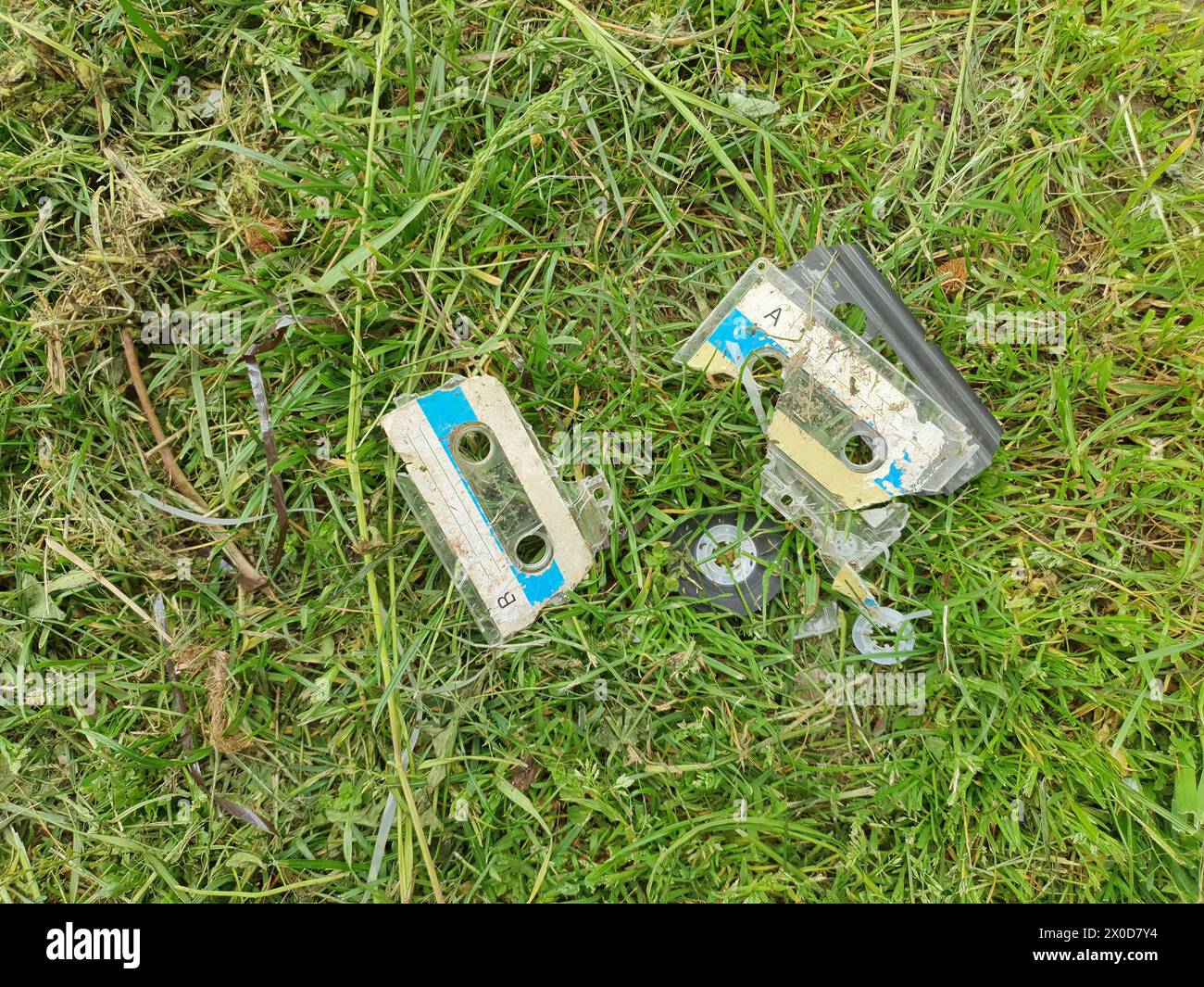 Vintage Broken Tape Cassette In The Grass Top View Stock Photo - Alamy