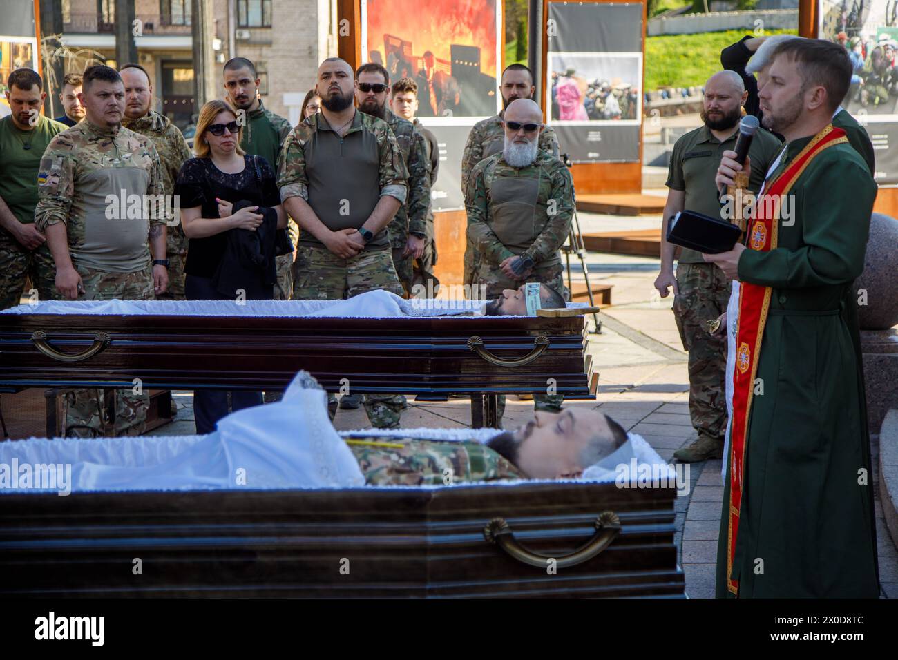 Non Exclusive: KYIV, UKRAINE - APRIL 9, 2024 - A priest partakes in the ...