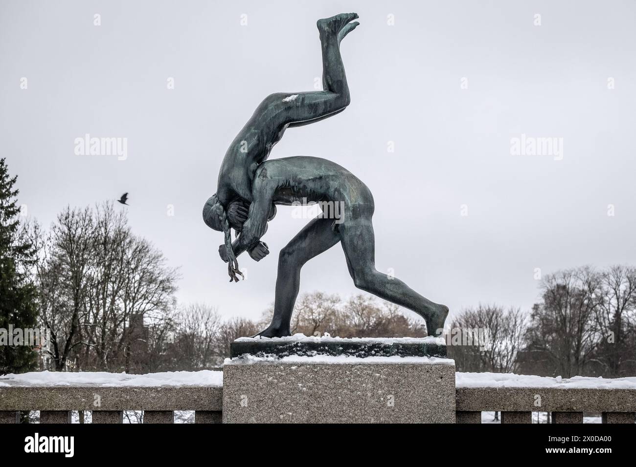 Statue by Gustav Vigeland of a man throwing a woman over his back ...