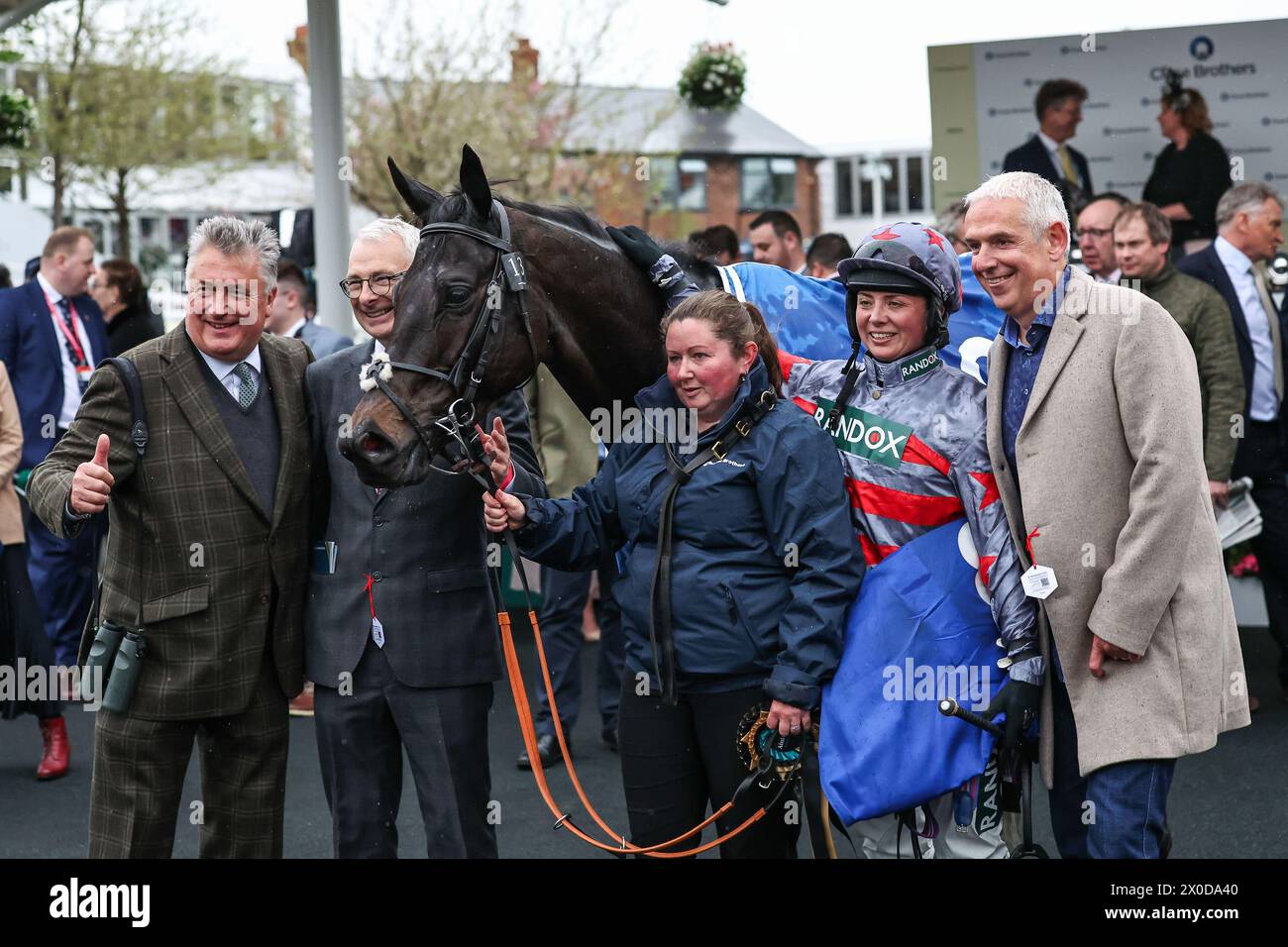 Bryony Frost horse owner Mr Andy Peake and trainer Paul Nicholls after ...