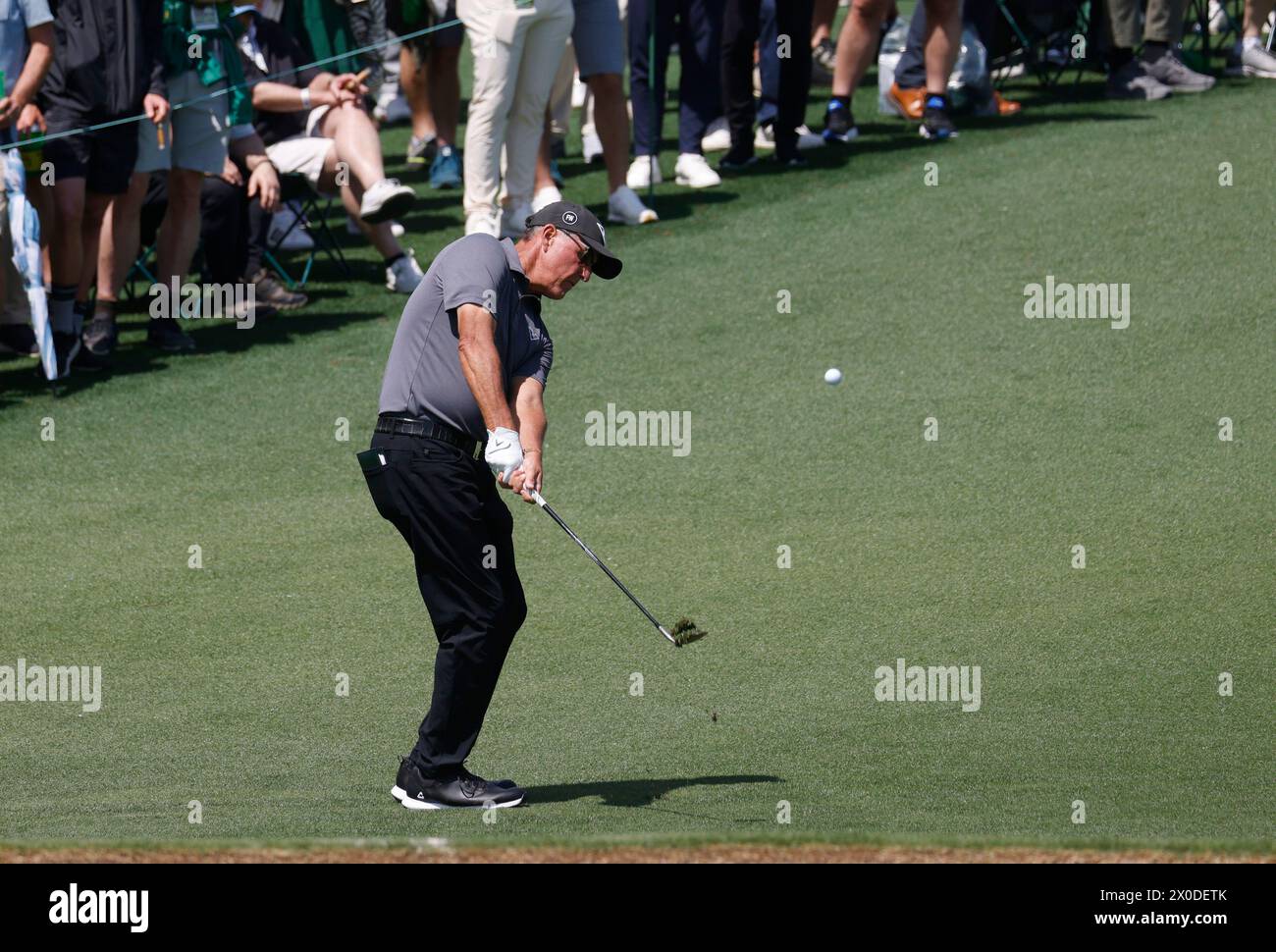 Augusta, United States. 11th Apr, 2024. Phil Mickelson chips to the ...