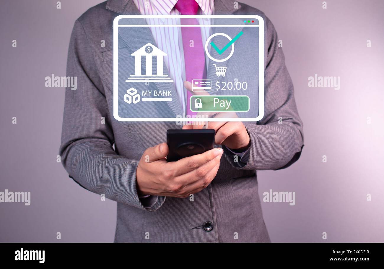 businessman arranging an electronic purchase from his smartphone. White ...