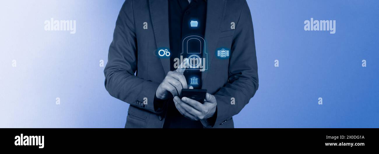 cybersecurity concept: businessman manages his data security from his ...