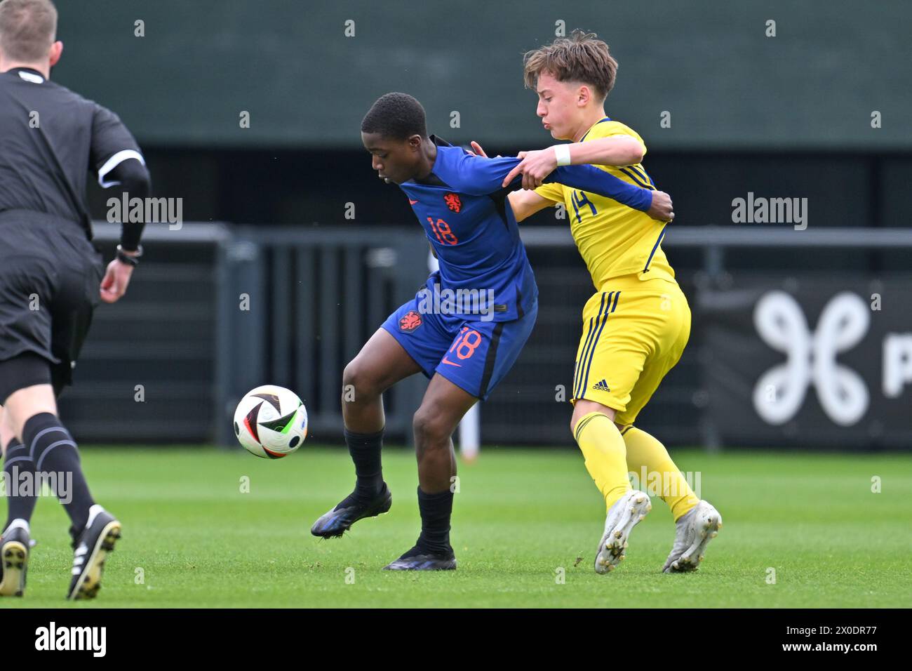 Pharell Nash (18) of The Netherlands and Dino Kolic (14) of Sweden ...