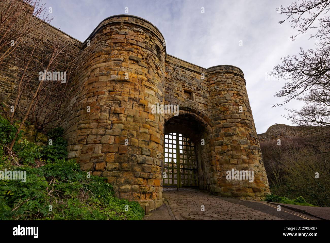The impressive twin towered gatehouse to Scarborough Castle, England ...