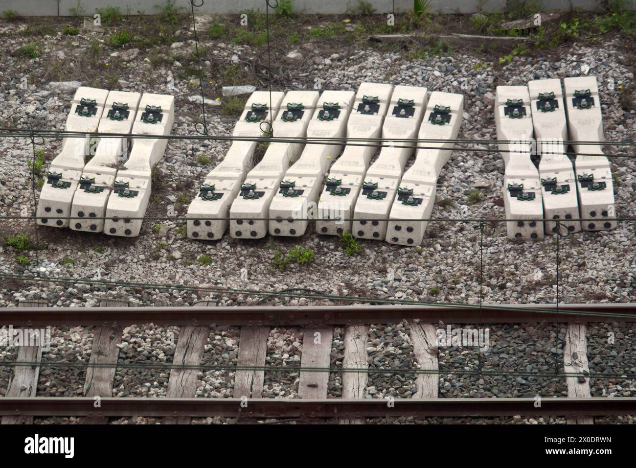 An aerial view captures the stark beauty of abandoned train rails and ...