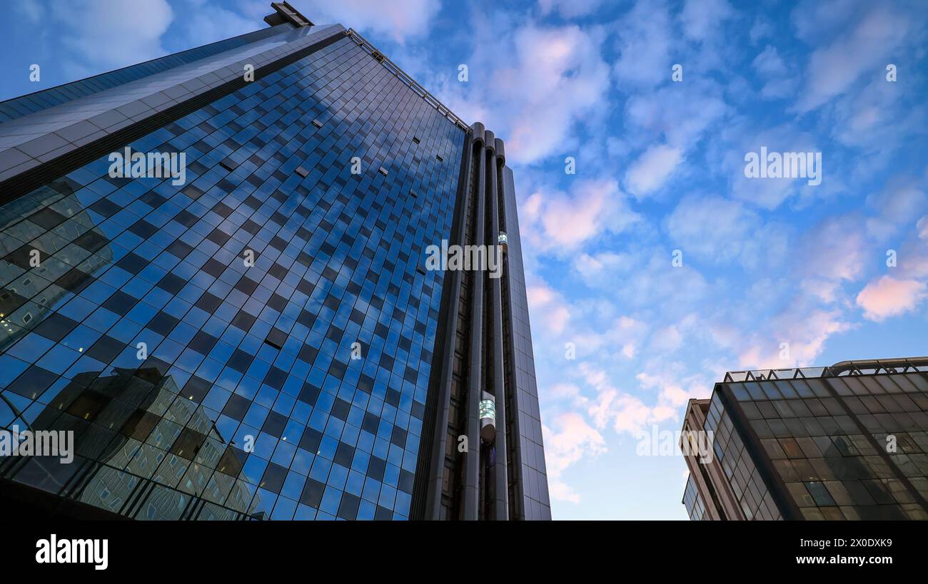 Modern skyscraper clouds time lapse hi-res stock photography and images ...