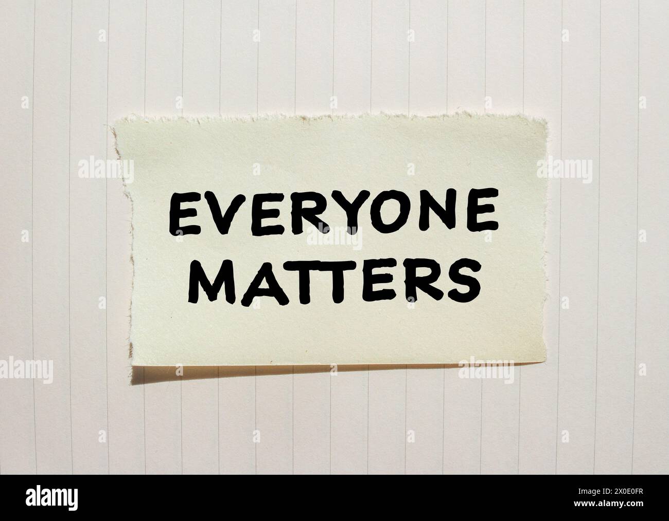 Everyone matters words written on ripped paper with notebook page ... Everyone matters words written on ripped paper with notebook page ...