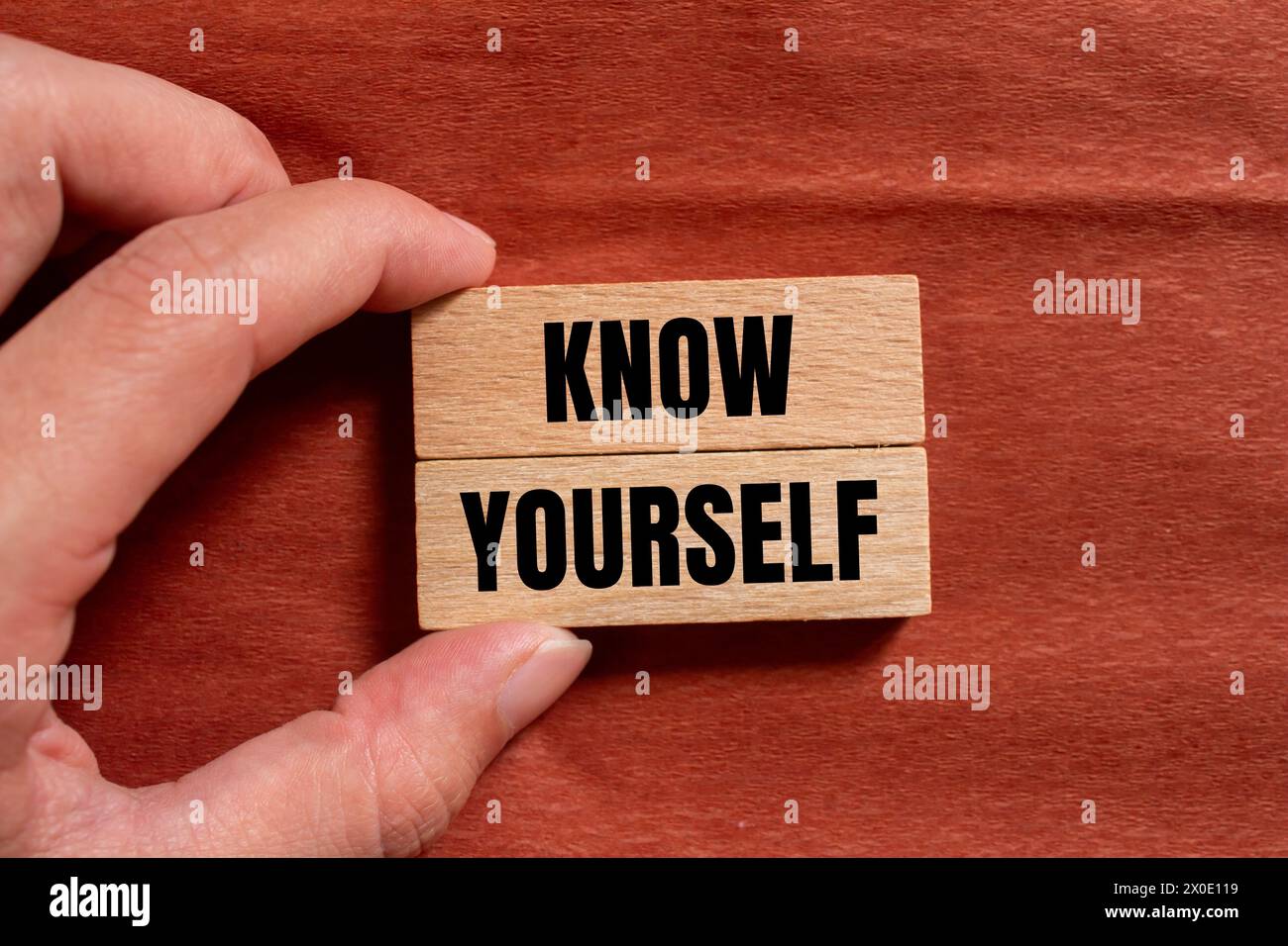 Know yourself words written on wooden blocks with brown background. Conceptual symbol. Copy ...