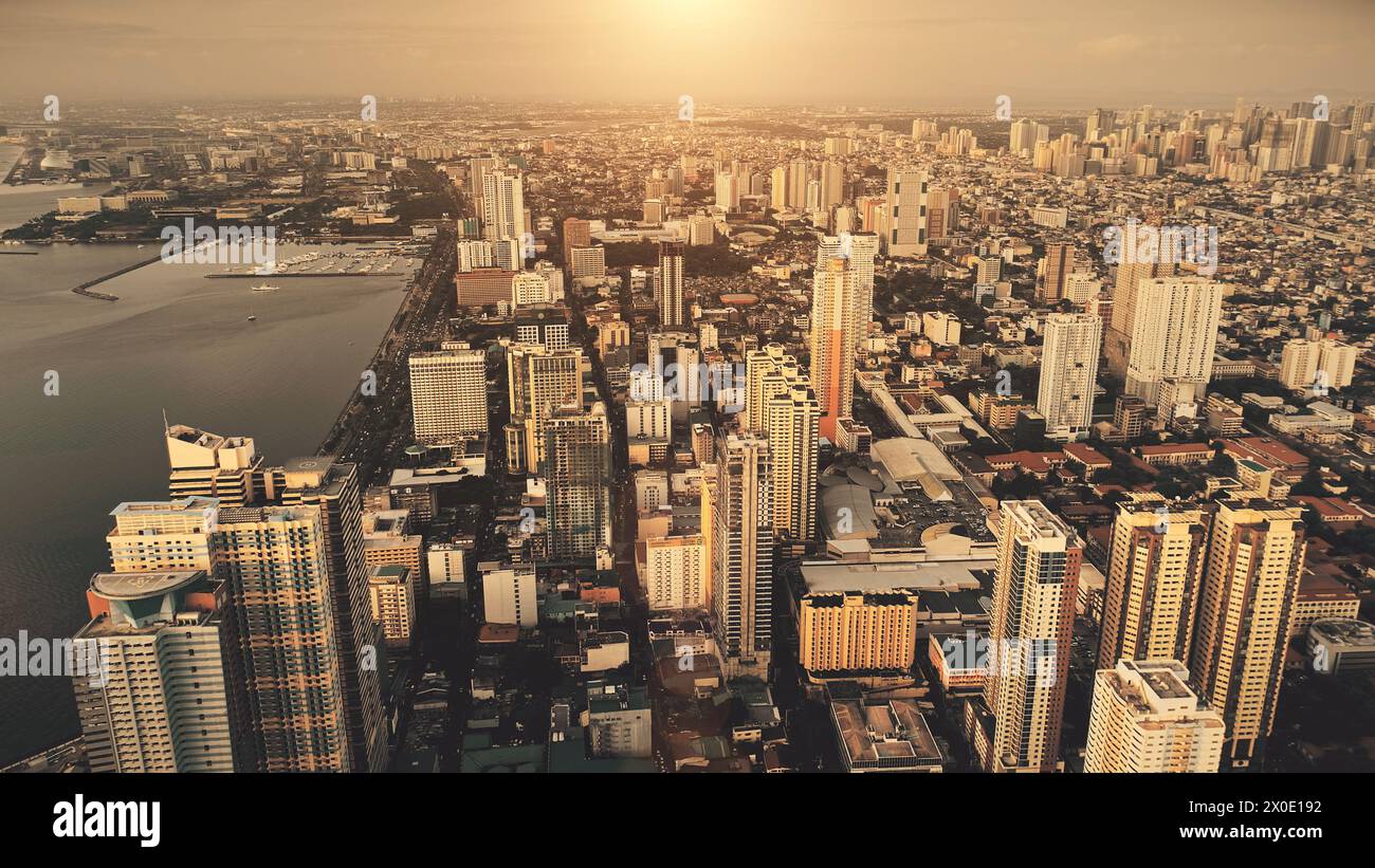Metropolis city at sea bay sunrise aerial. Philippines capital ...