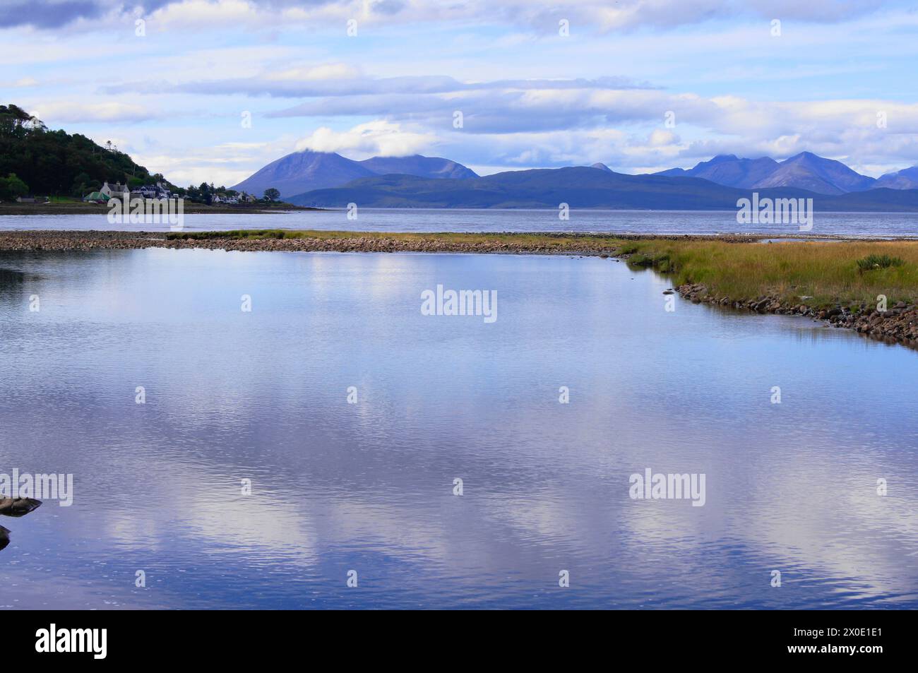 The Applecross River entering the Applecross Bay to Isle of Raasay and the Cuillins on the Isle ...