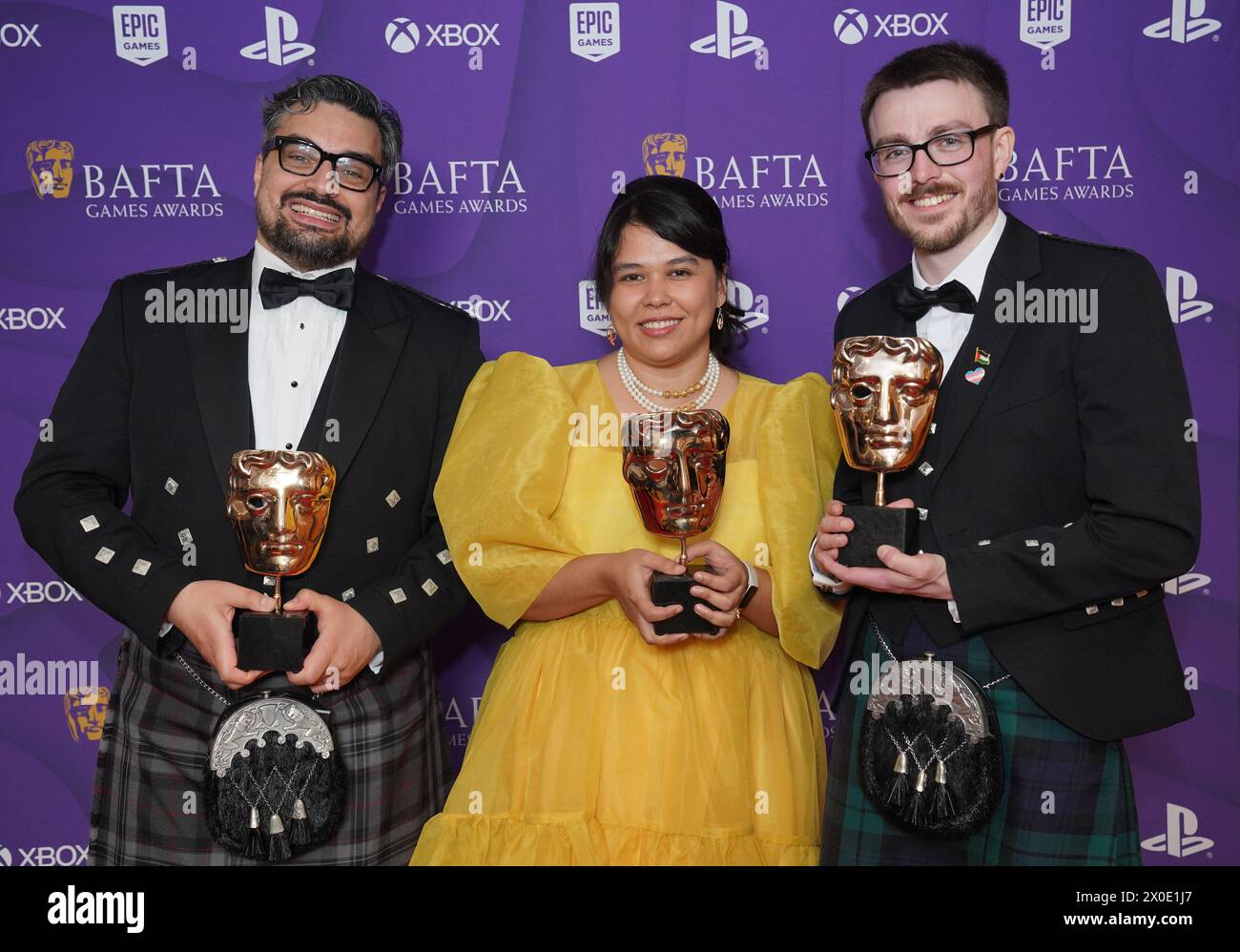 (left to right) Georg Backer, Gwendelyn Foster, and Matthew Stark pose ...
