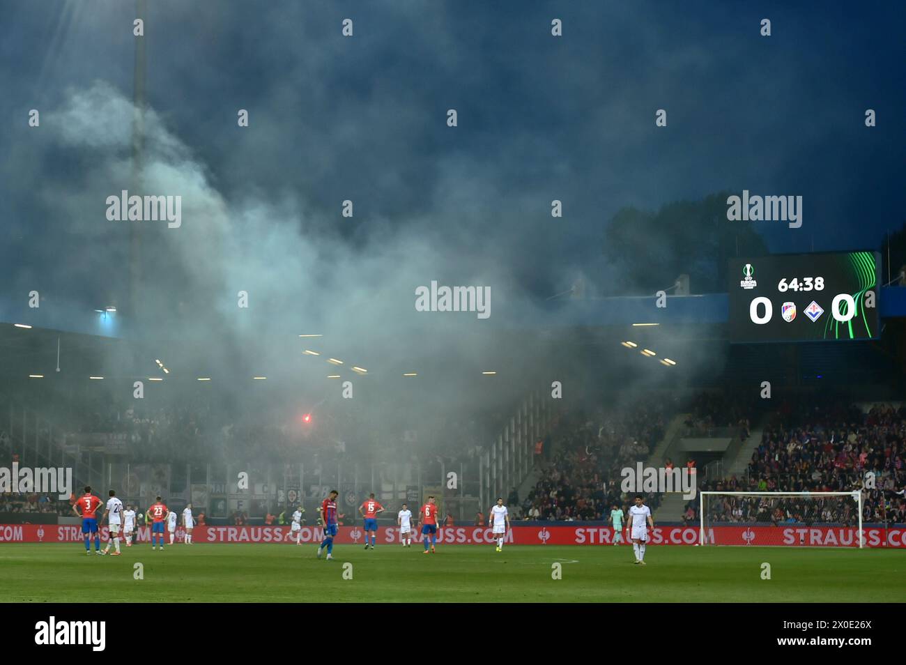 Pilsen, Czech Republic. 11th Apr, 2024. Fans of Fiorentina with smoke ...