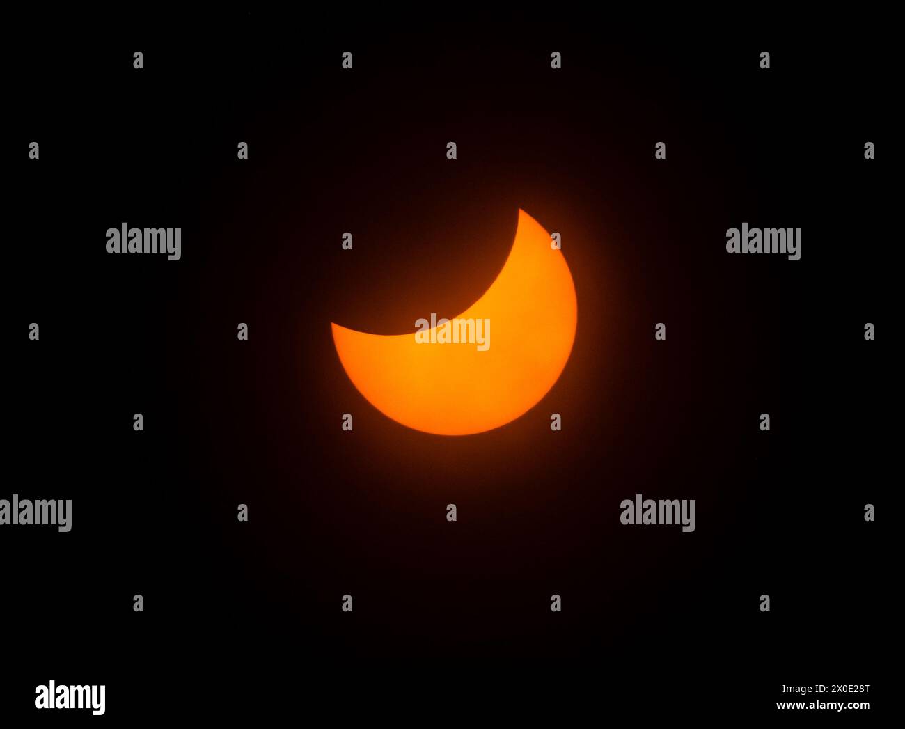 The Solar Eclipse 2024, the sun partially blocked by the Moon. Central ...