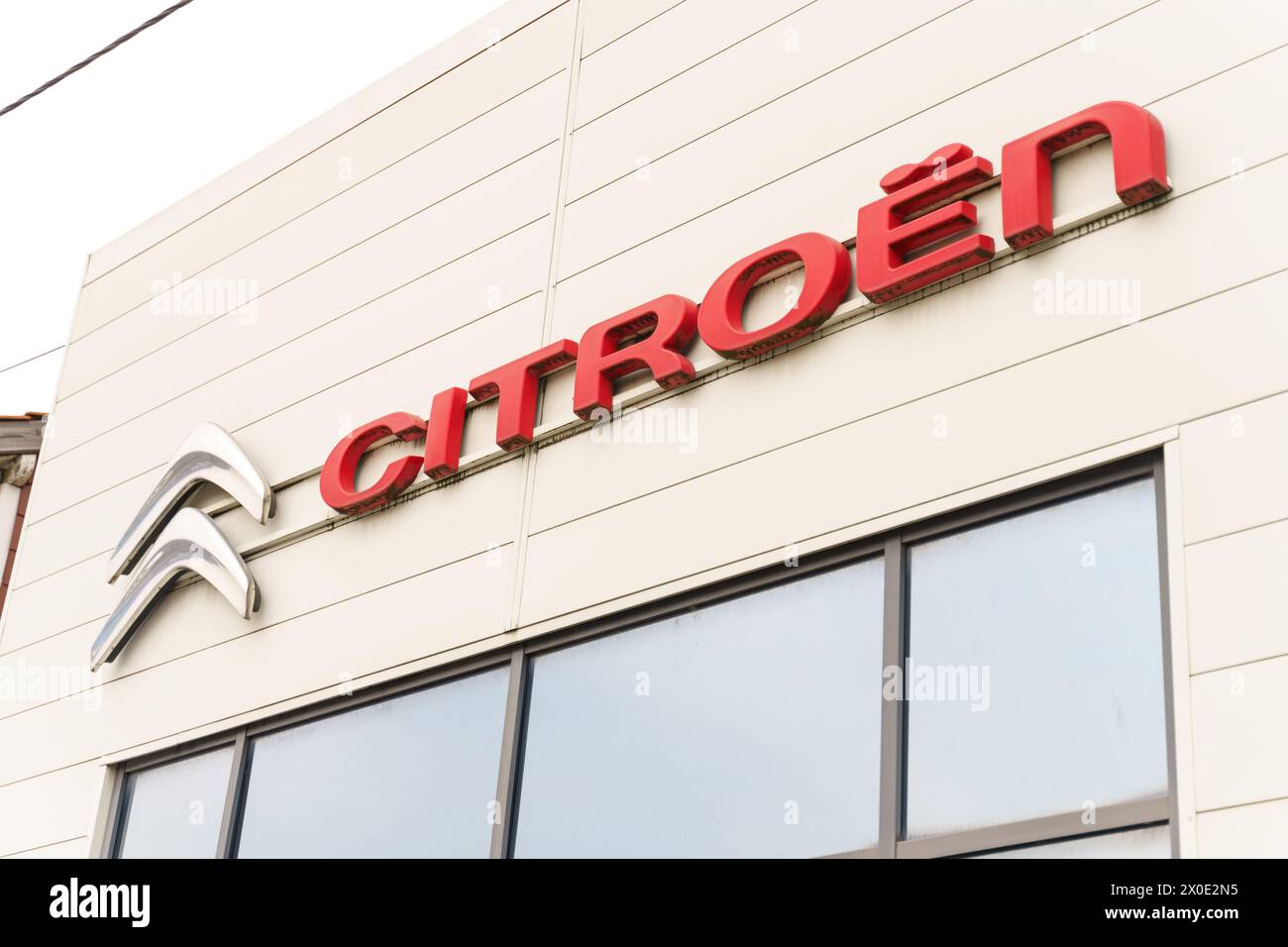 Cambrai, France - May 21, 2023: The well-lit sign of a Citroen car ...