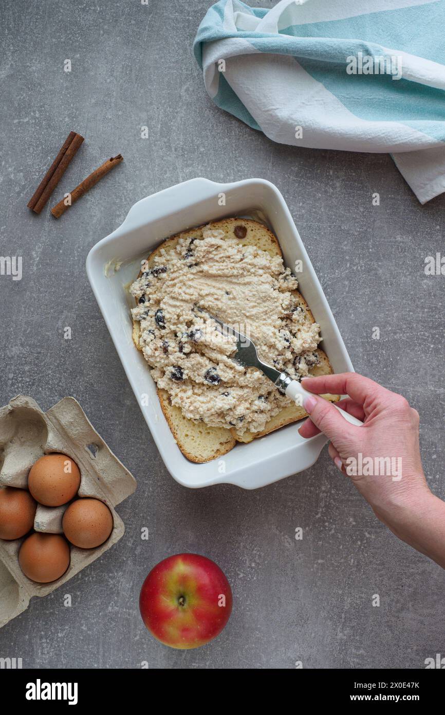 Caucasian woman prepares typical slovak apple pie - zemlovka - made ...