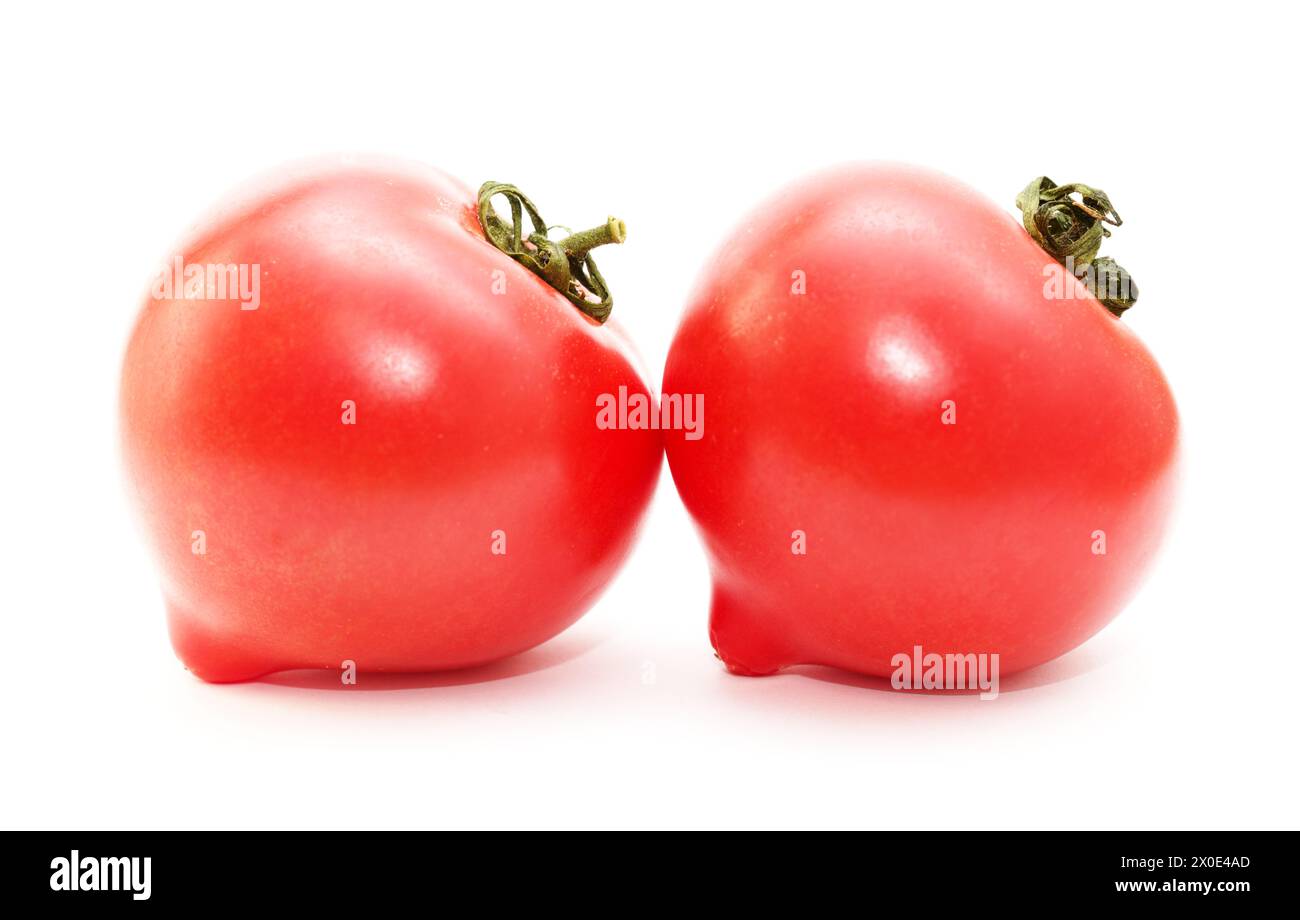 Round Pink tomato with a nose that produces heart shape when cut in ...