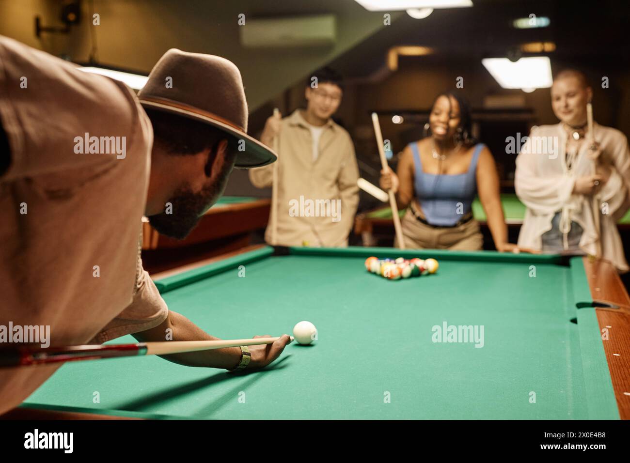 Diverse people play billiard hi-res stock photography and images - Alamy
