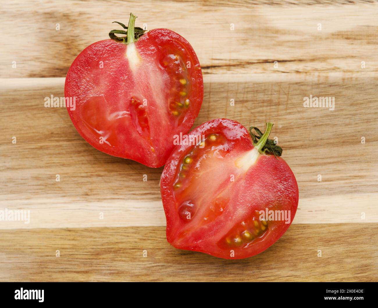 Round Pink tomato with a nose that produces heart shape when cut in ...