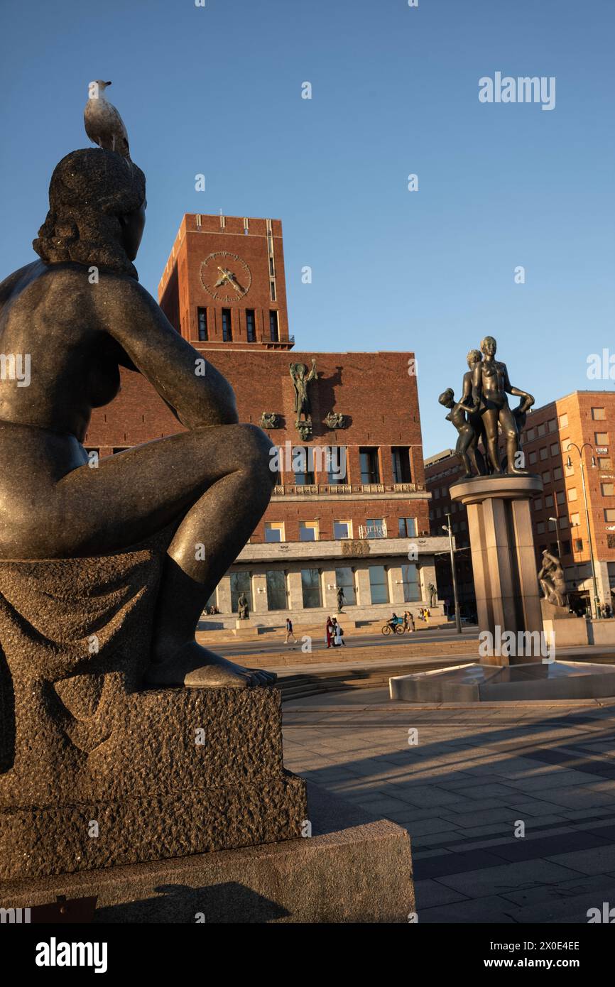 Statues at Rådhusplassen, Oslo, Norway. Rådhusplassen ("The City Hall ...