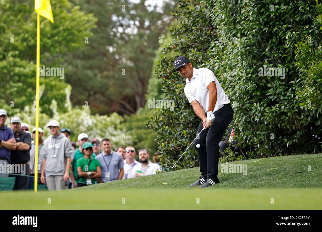 Augusta, United States. 11th Apr, 2024. Xander Schauffele chips to the ...