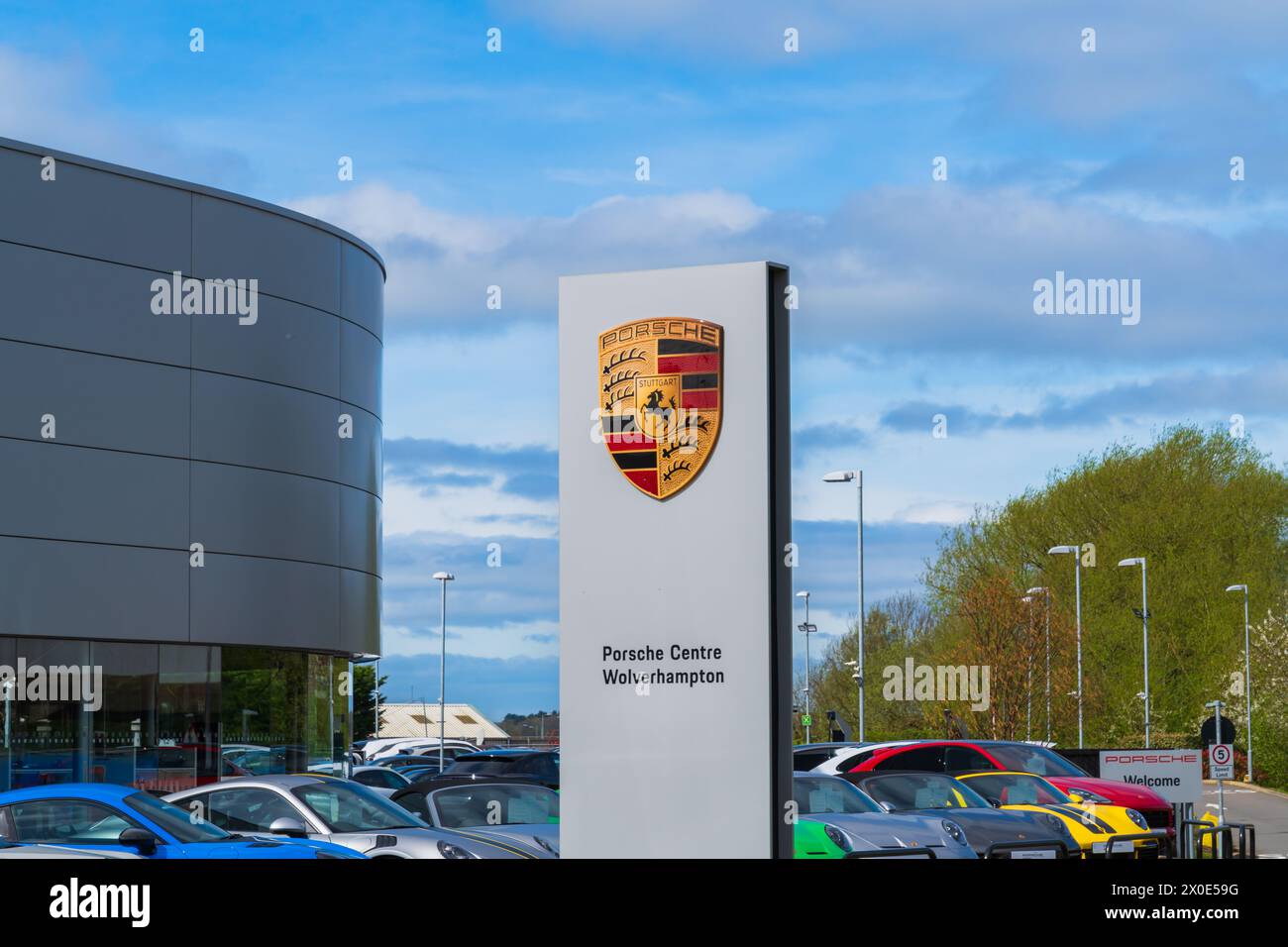 Wolverhampton, UK – April 11 2024: External signage at a Porsche ...