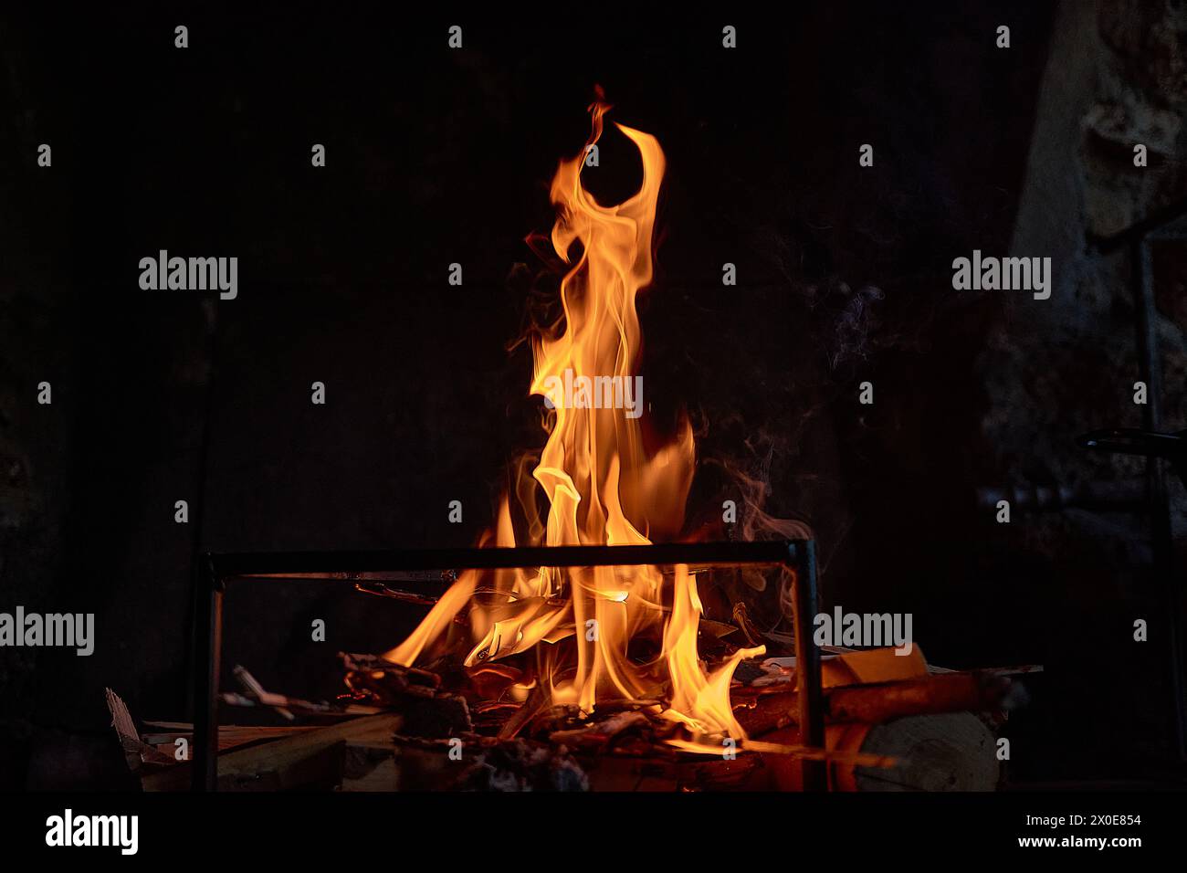 High resolution photo of flame and sparkl on black table. fire flames ...