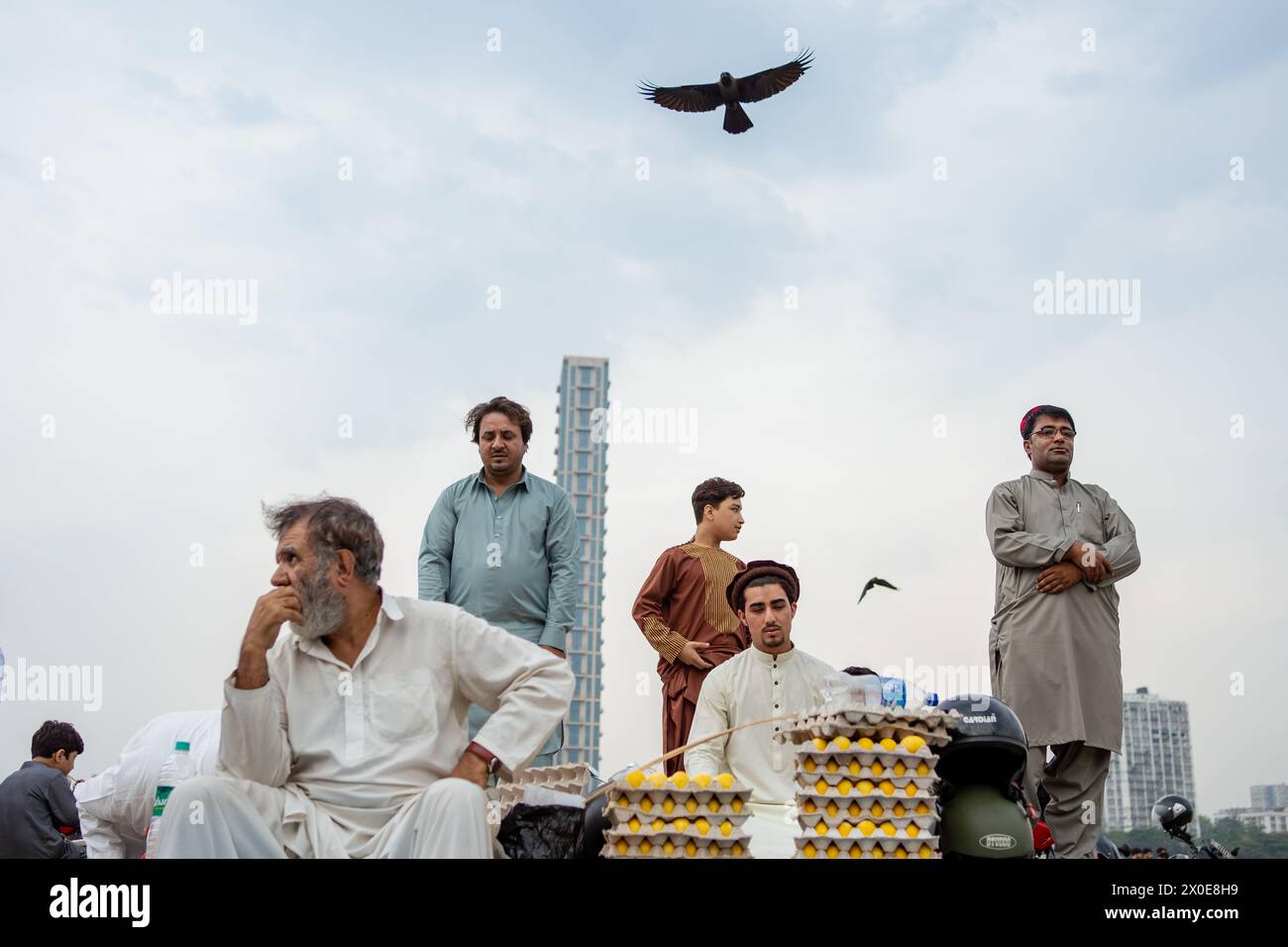 Afghan Muslims buy yellow eggs during the Eid al-Fitr celebration ...
