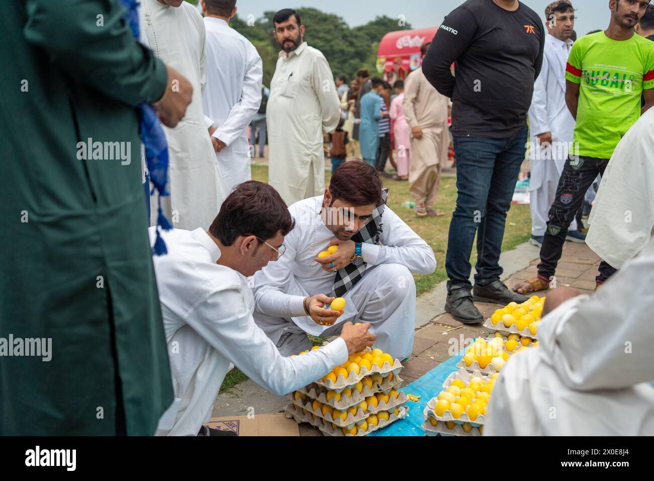 Afghan Muslims buy yellow eggs during the Eid al-Fitr celebration ...
