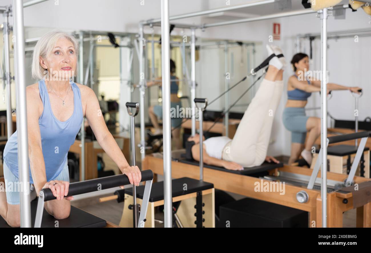 Pilates reformer older woman hi-res stock photography and images - Alamy
