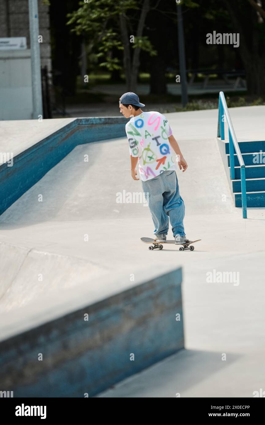 A daring young skater confidently riding his skateboard up the side of ...