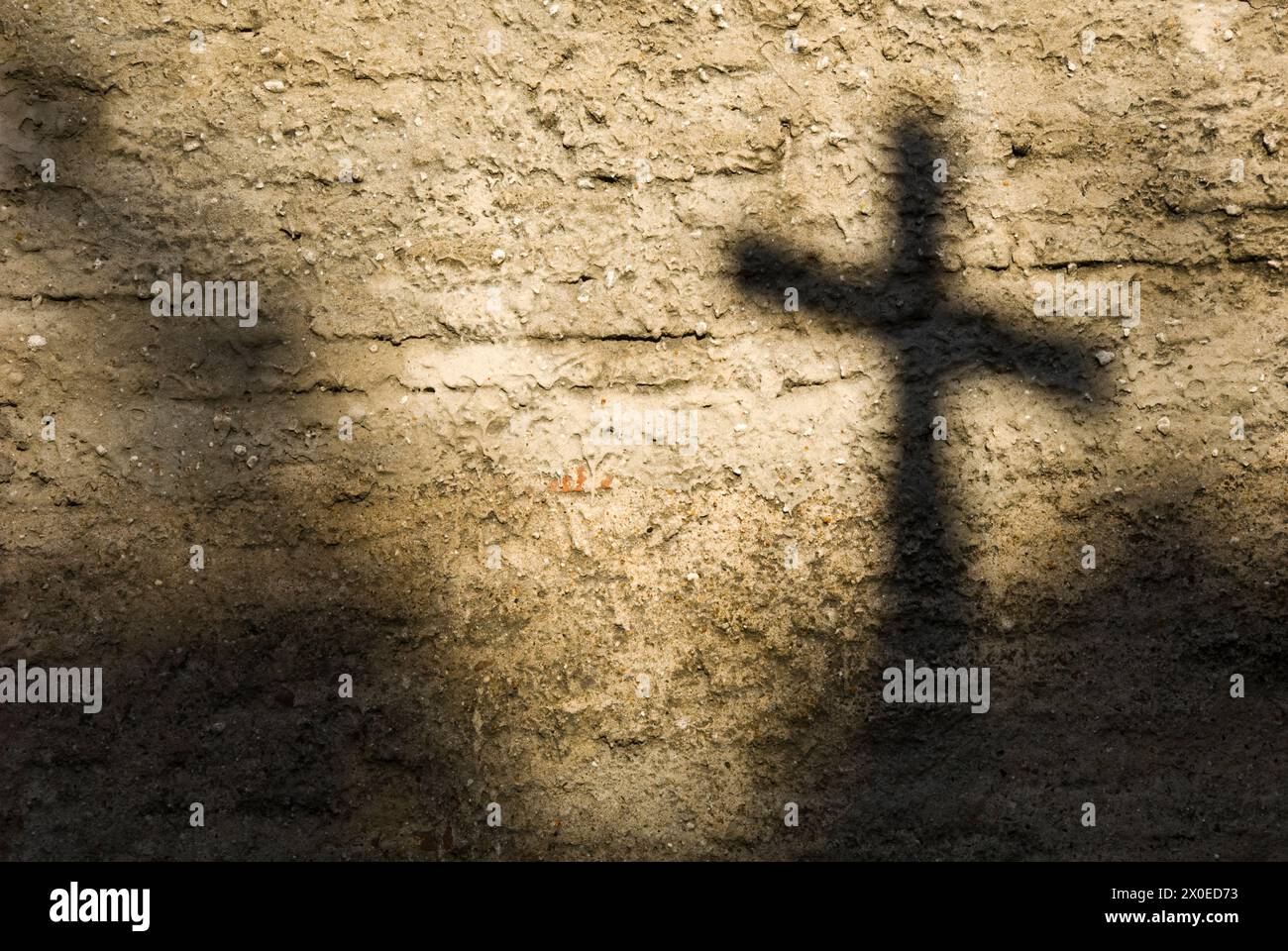 shadow of a cross on adobe wall - one of the world's great necropolises ...