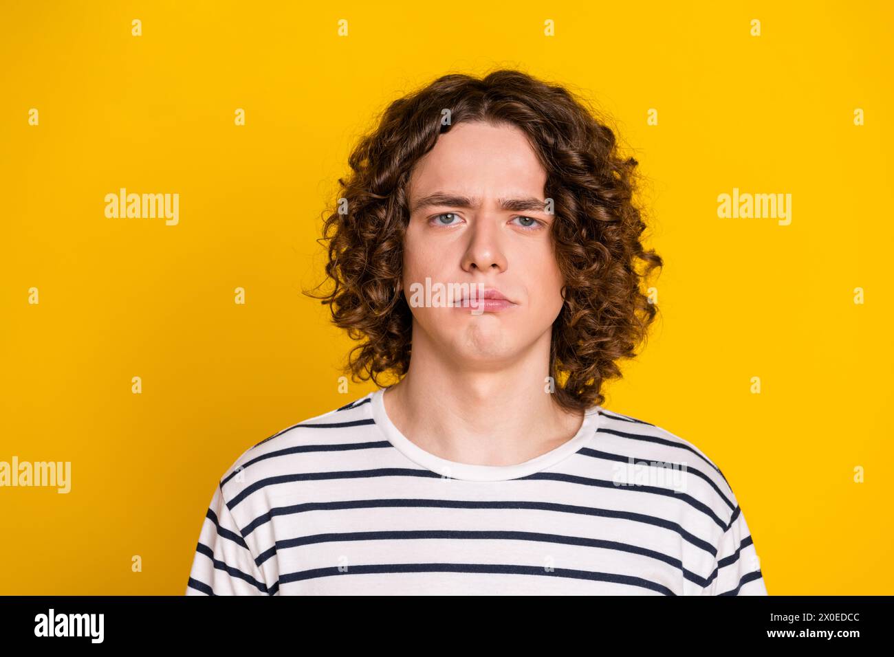 Closeup photo of young funny face expression upset guy in striped t ...