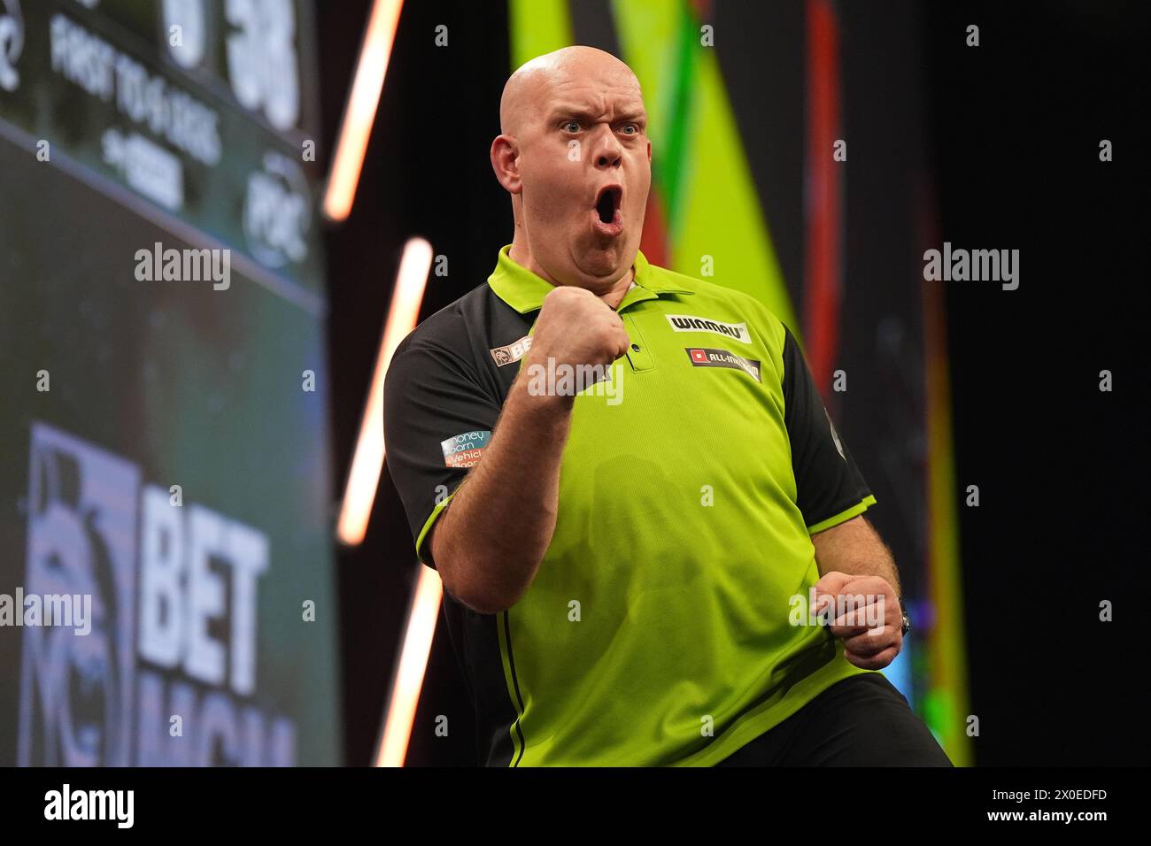 Michael van Gerwen celebrates winning a leg against Luke Littler (not ...