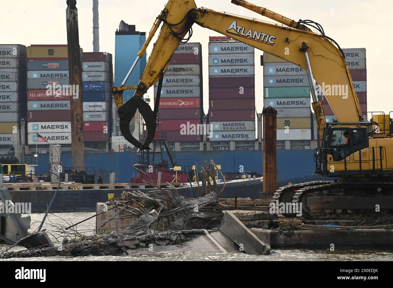 Response crews continue salvage and wreckage removal operations on the ...