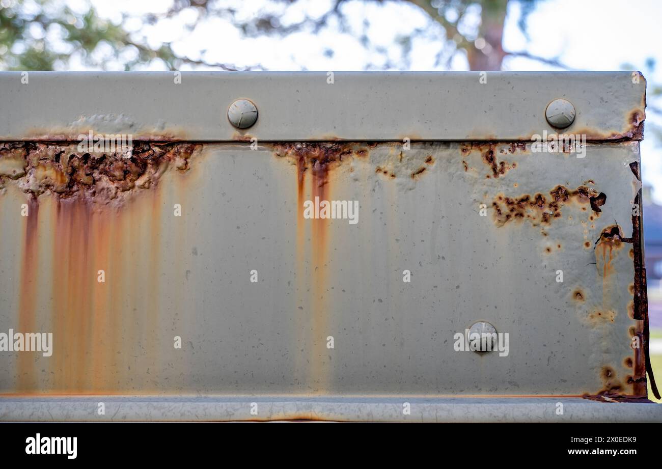 Rusted and peeling paint on an electrical transformer exposed to the ...